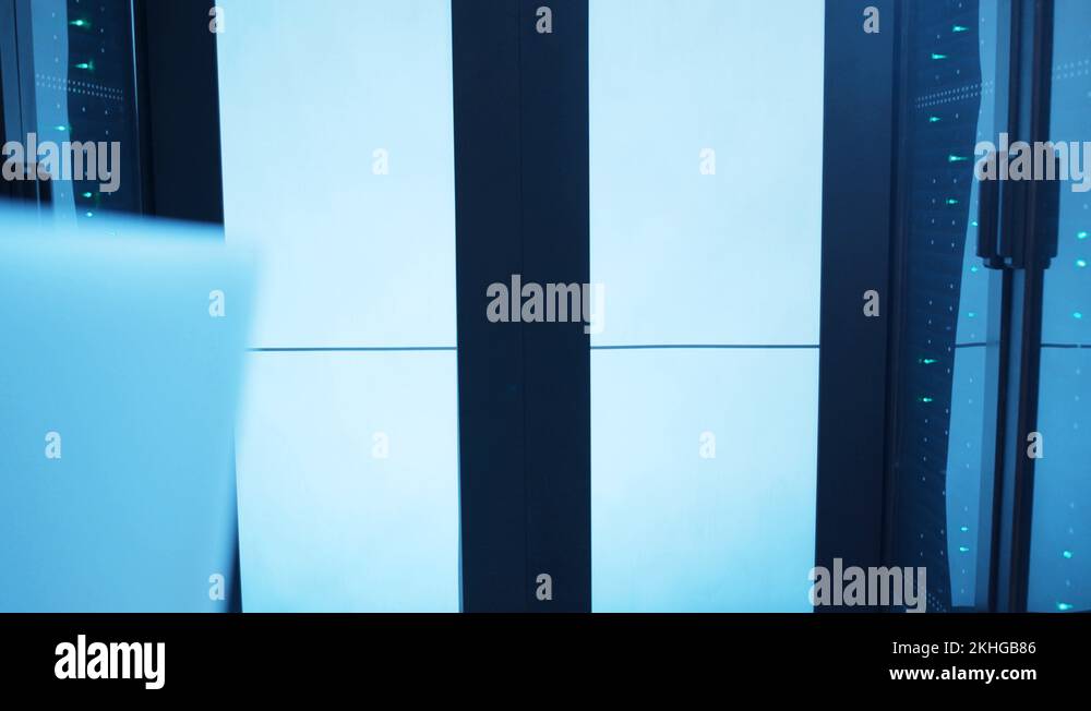 Professional young data center team of kids standing in middle of ...