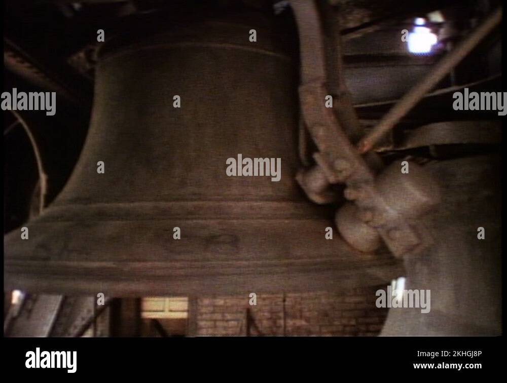 LONDON, ENGLAND, 1976, Big Ben chime bell, hammer strikes, pan to Big ...