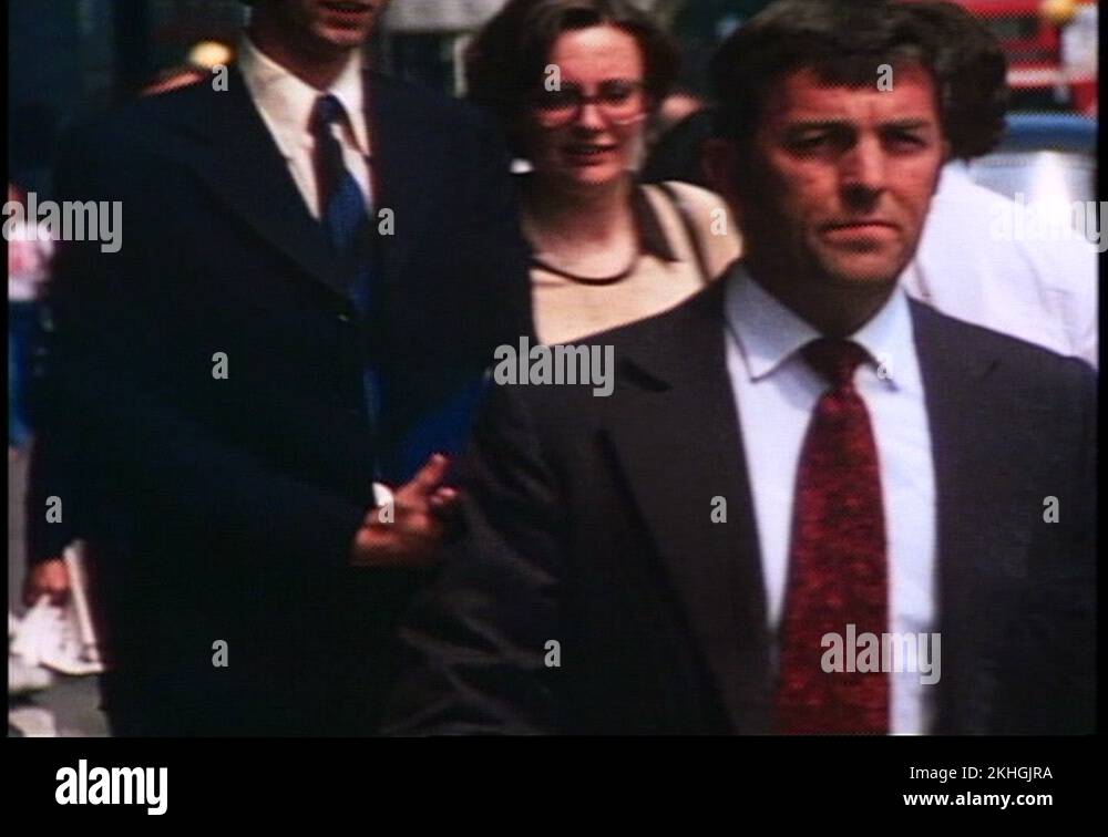 LONDON, ENGLAND, 1976, The City, financial district, crowd on sidewalk ...