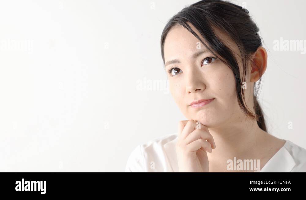 Thinking young asian woman. Particle animation of question marks Stock ...