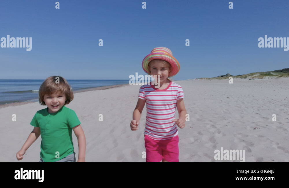 Aerial. Portrait of children on beach in summer. Happy children, boy ...