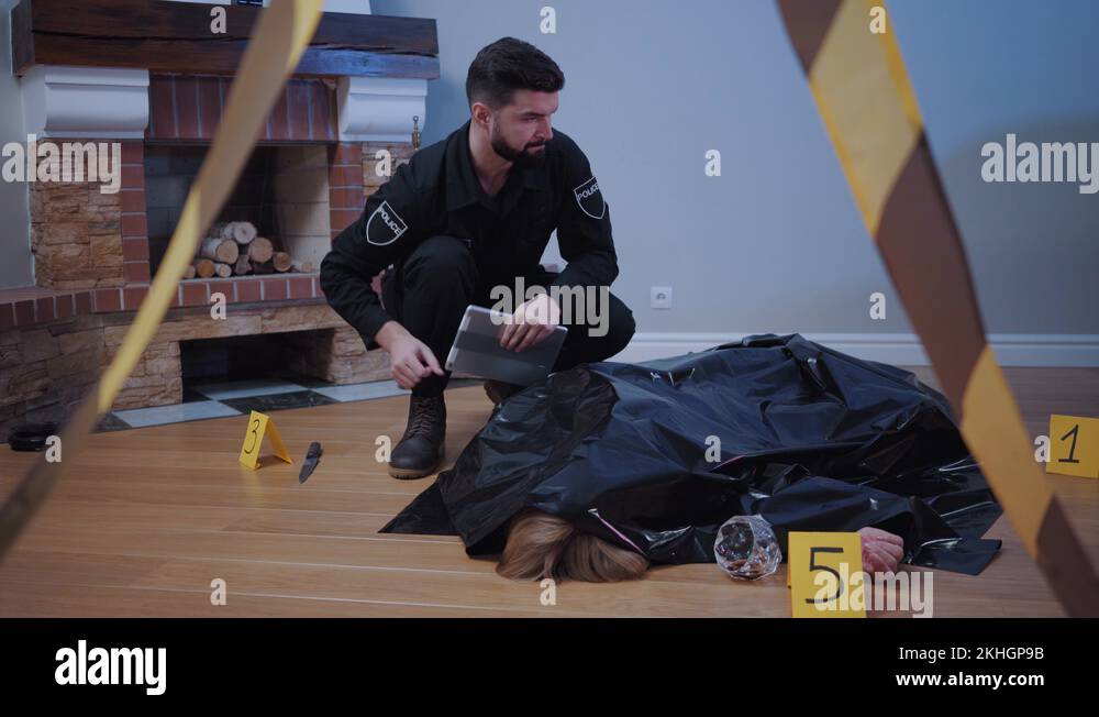 Bearded Caucasian police officer standing up and leaving as murdered ...
