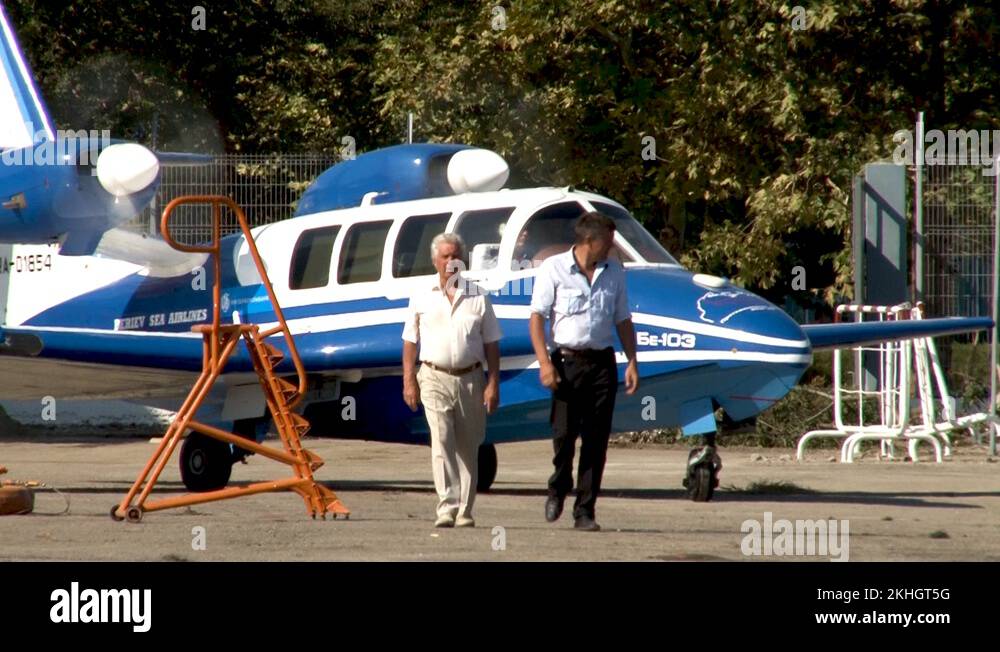 Be-103 amphibious aircraft unfolds in parking lot and stops with ...