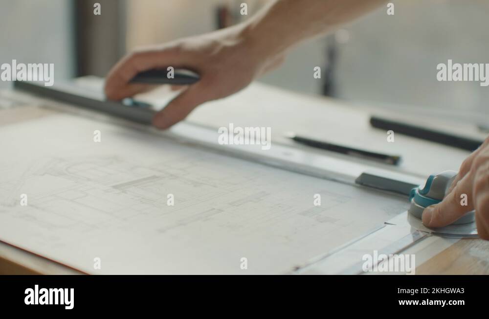 Architect's desk: drawings, tape measure, ruler and other drawing tools ...