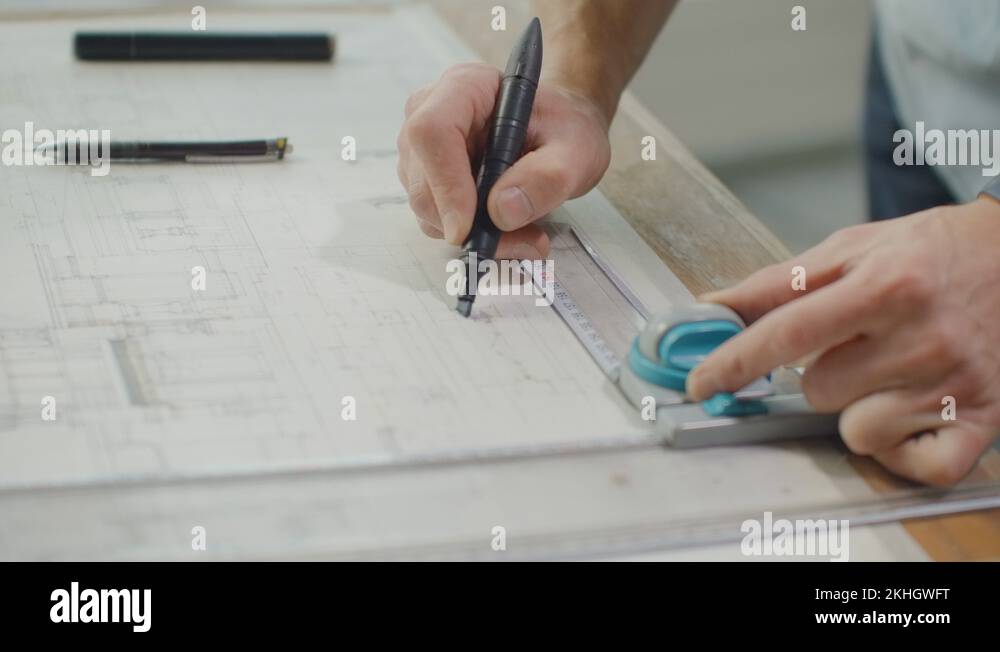 Architect's desk: drawings, tape measure, ruler and other drawing tools ...
