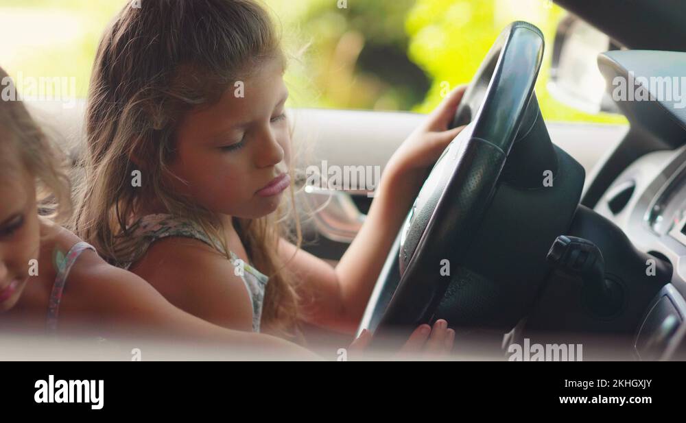 Two children driving little car Stock Videos & Footage - HD and 4K ...
