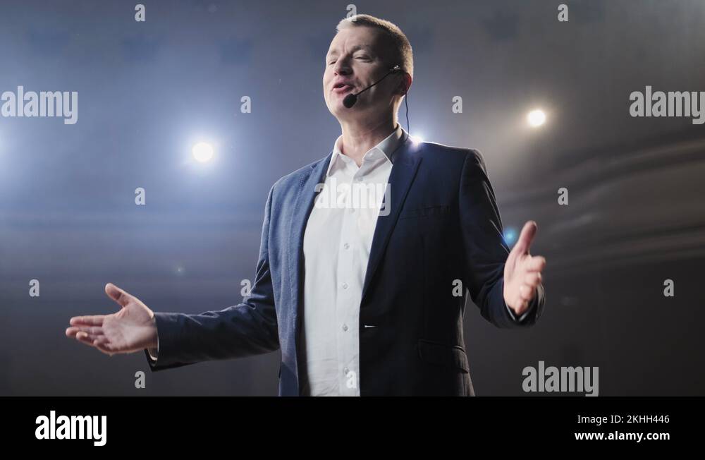 Person speaking into microphone Stock Videos & Footage - HD and 4K ...