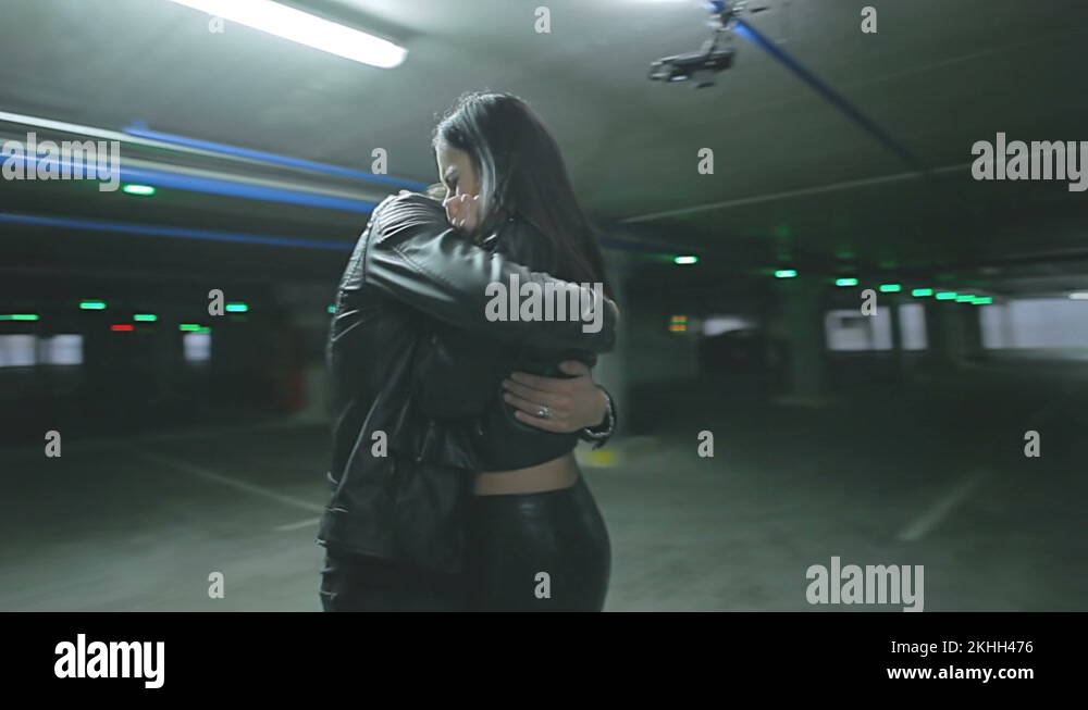 Separation, a young couple gently embraces Stock Video Footage - Alamy