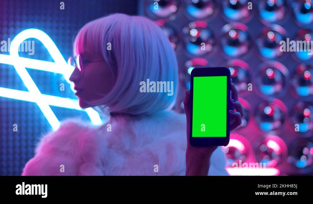 Stylish Person Hand Holding a Mobile Telephone with Green Screen Mockup ...