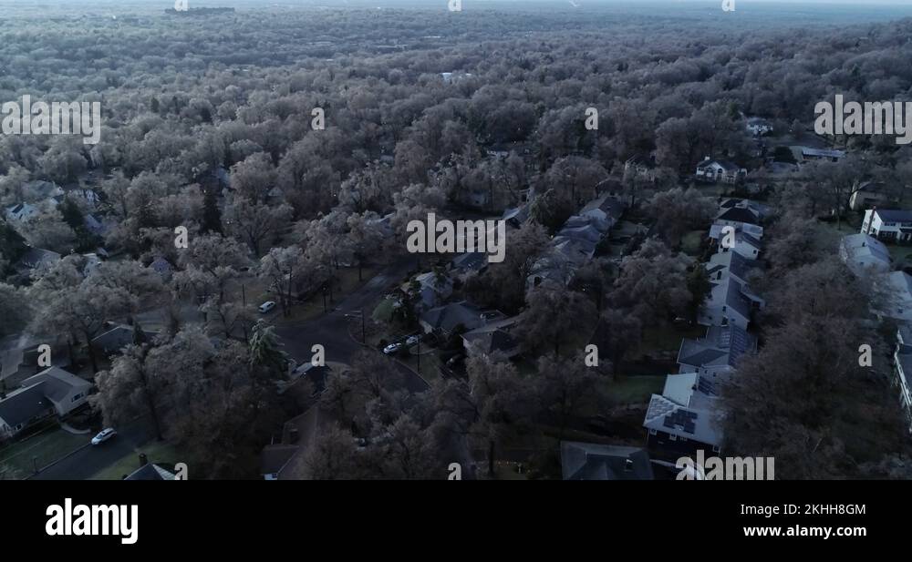 Iconic 4K aerial of a typical American suburb neighborhood in winter ...