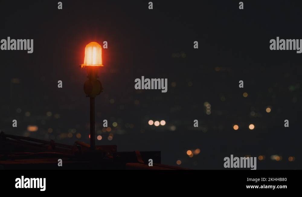 Indicator red light blink on the top of high building tower for Safety ...