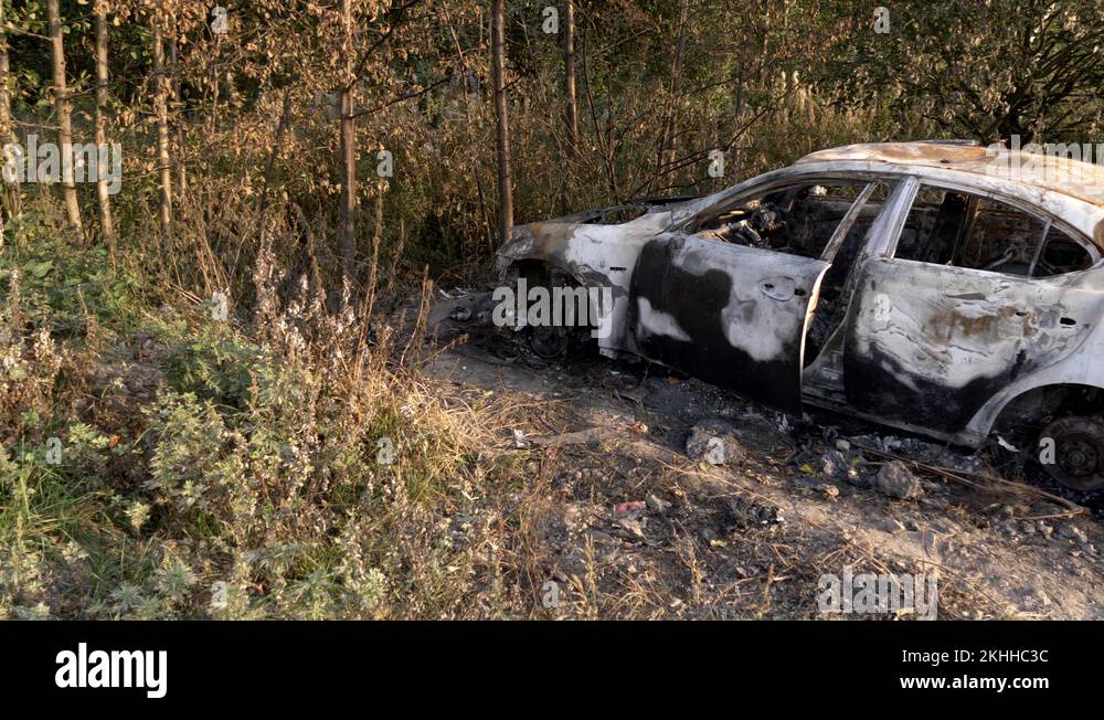 Burnt out, Wrecked car after an explosion or fire Stock Video Footage ...