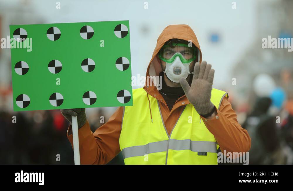 Man gas mask hand gesture. Stop environmental pollution. People looking ...
