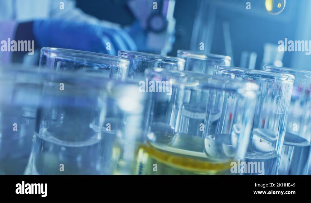 Pharma Lab: Pipette Dropping Yellow Liquid into Test Tubes, Medical ...