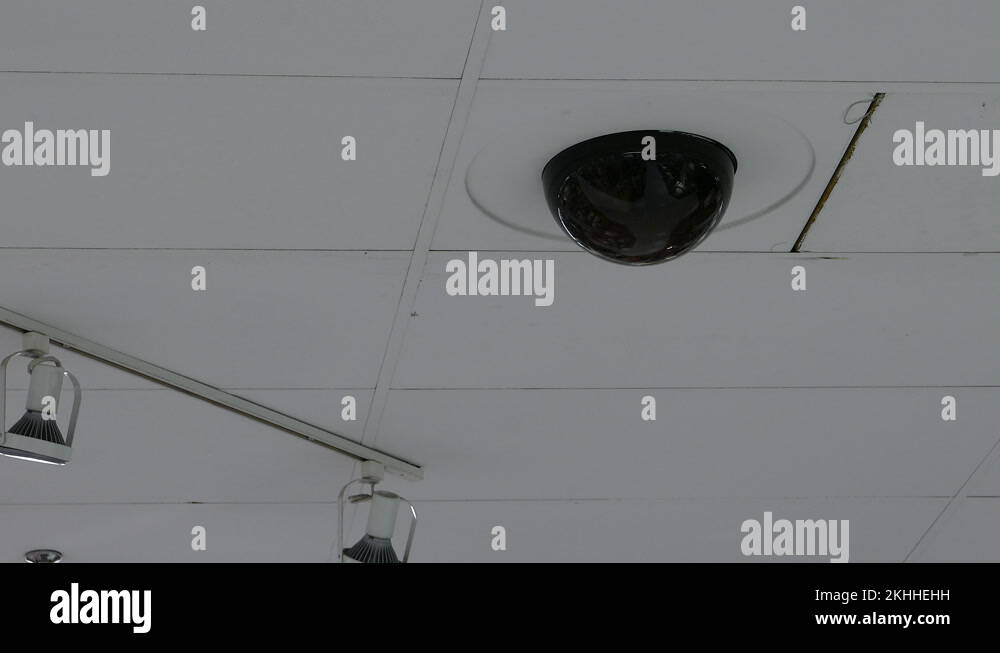 Dome security camera on top of ceiling inside mall with 4k resolution ...