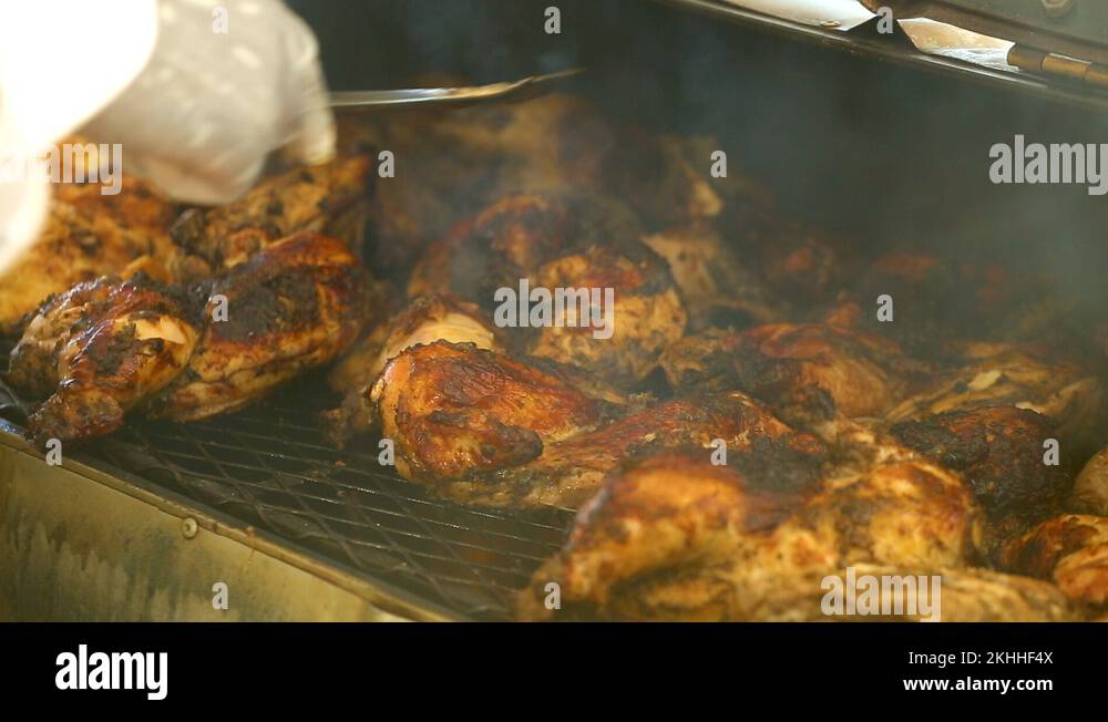 Jerk chicken bbq Stock Videos & Footage - HD and 4K Video Clips - Alamy