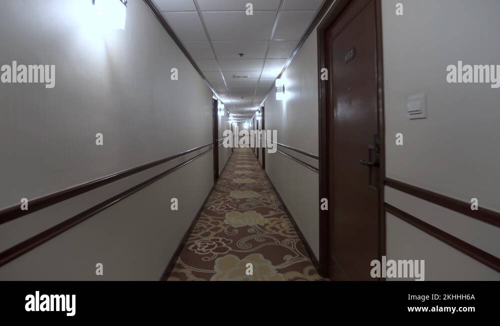 Point of View of Walking Down Old Fashioned Hotel Corridor Passing ...