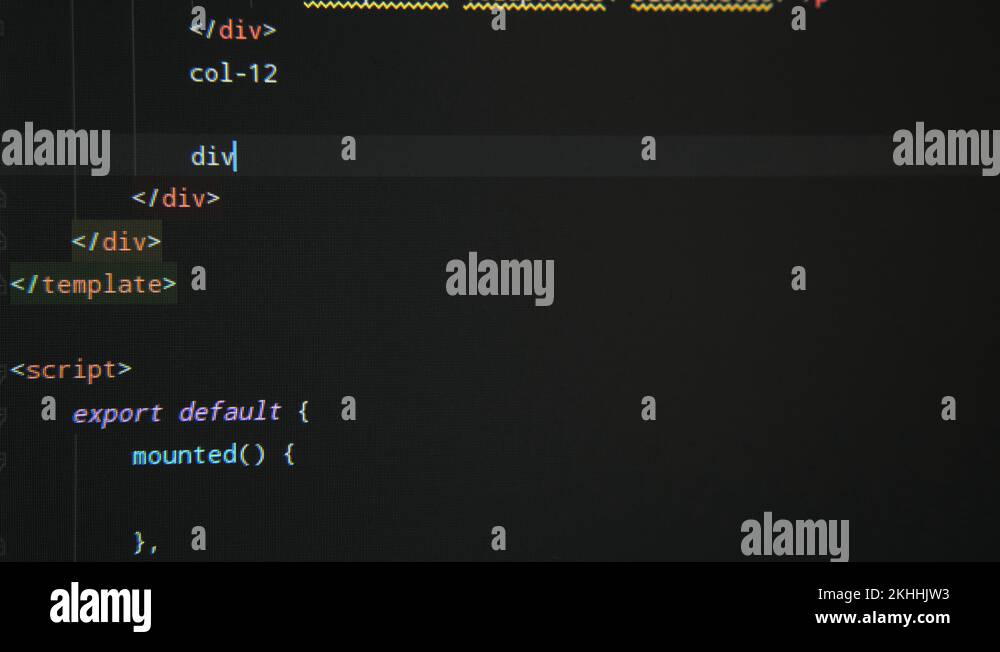 The programming work depicted on a wide black pc screen with many ...