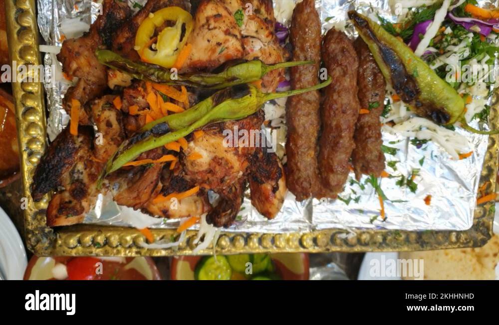 Eating barbecue in Egypt Middle East grill food beef and chicken serve ...