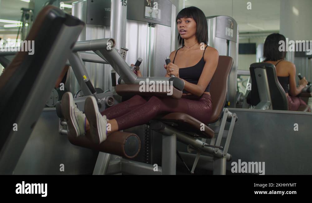Gym machine leg lift Stock Videos & Footage - HD and 4K Video Clips - Alamy