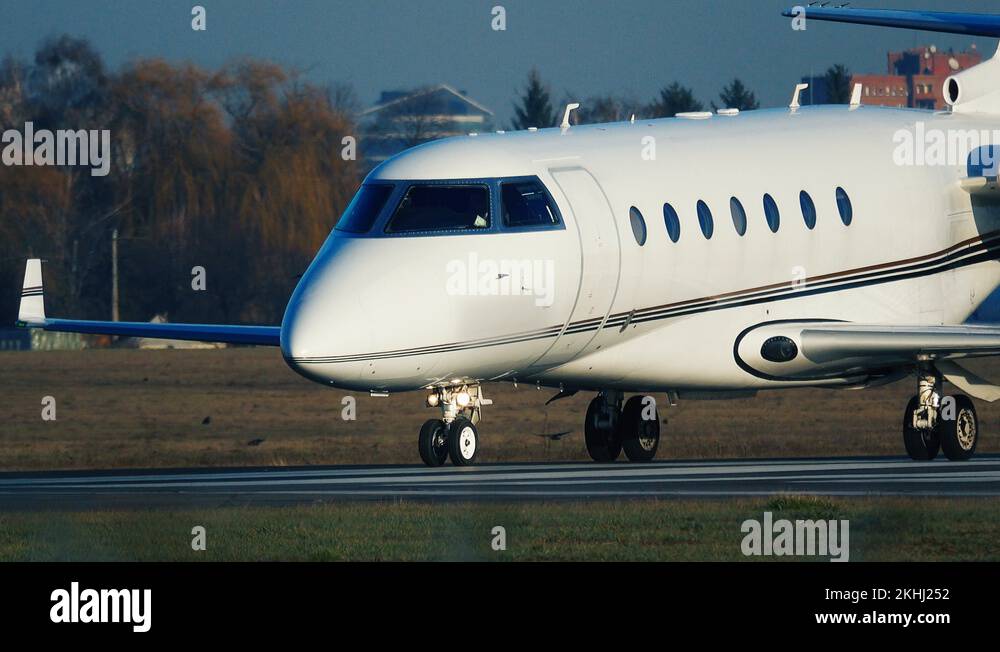 Business jet (private jet) taxiing on the runway after landing at ...