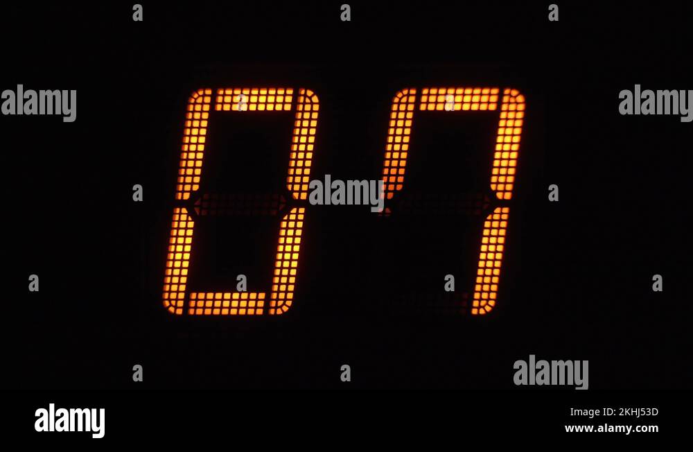Digital countdown in orange numbers on an electronic display from 0 to ...