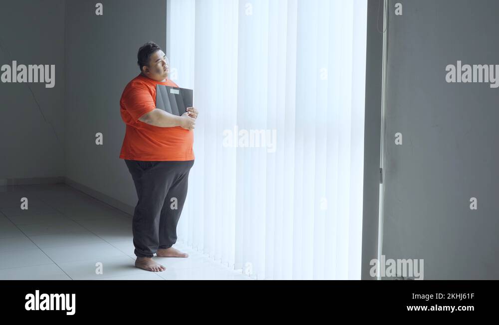 Sad obese man Stock Videos & Footage - HD and 4K Video Clips - Alamy