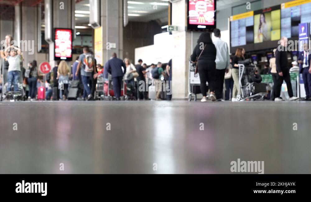 Busy airport passengers, aircraft crew and staff in an airport Stock ...
