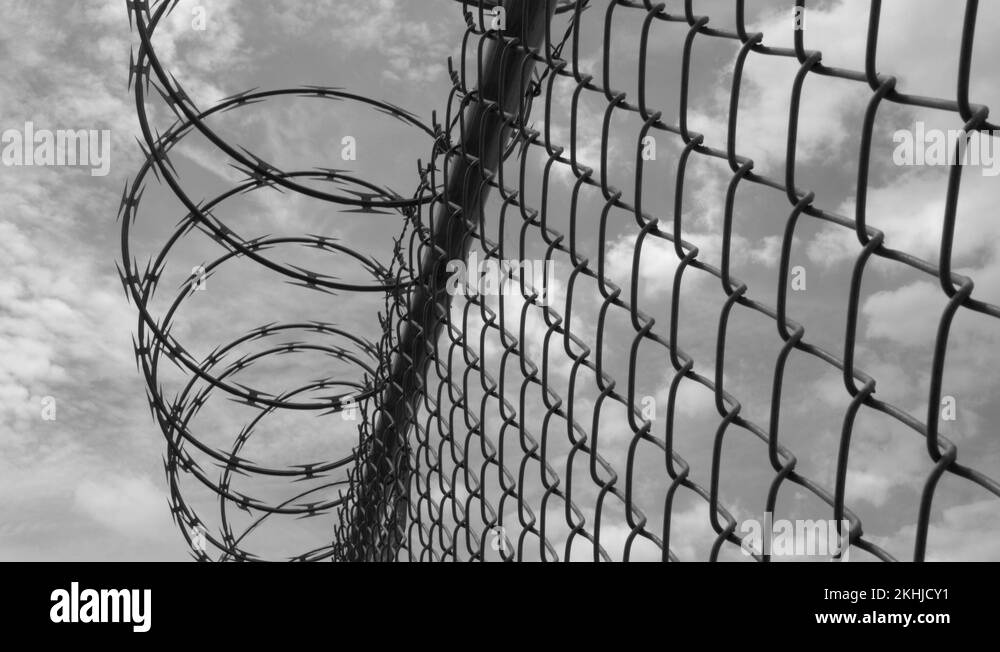Coiled barbed wire fence Stock Videos & Footage - HD and 4K Video Clips ...