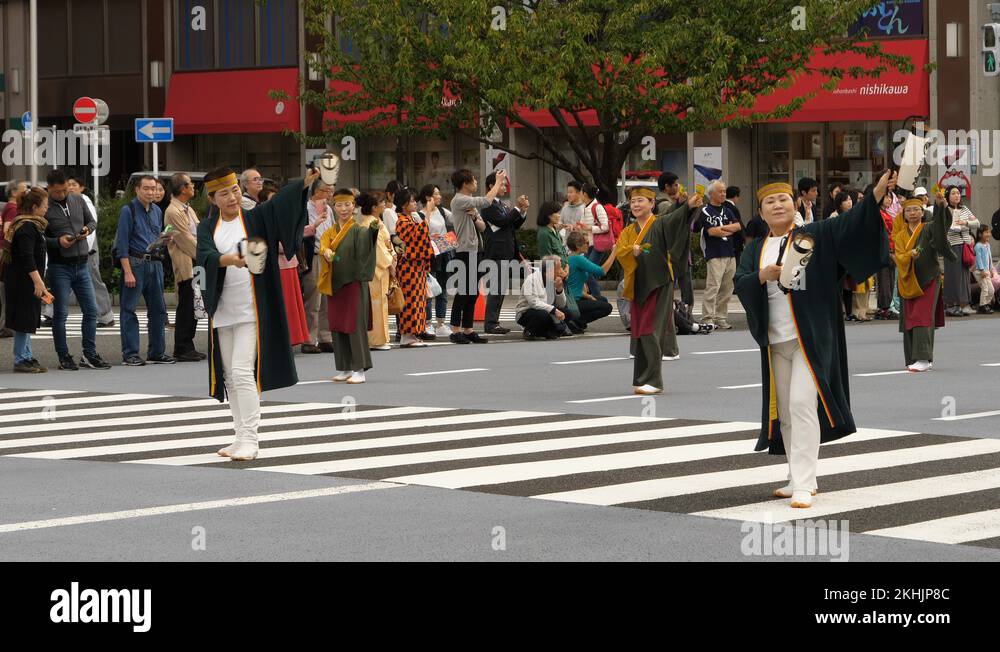 Japanese shouting and dancing on the streets with their costumes Stock ...