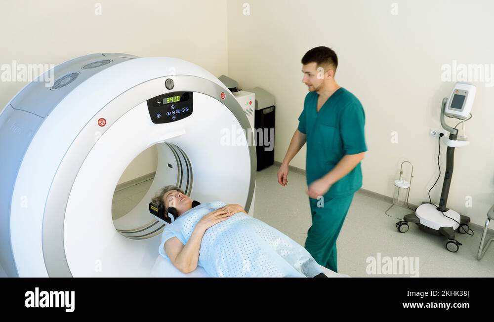 Elderly female patient on medical examination. CT or MRI scan. 4K Stock ...