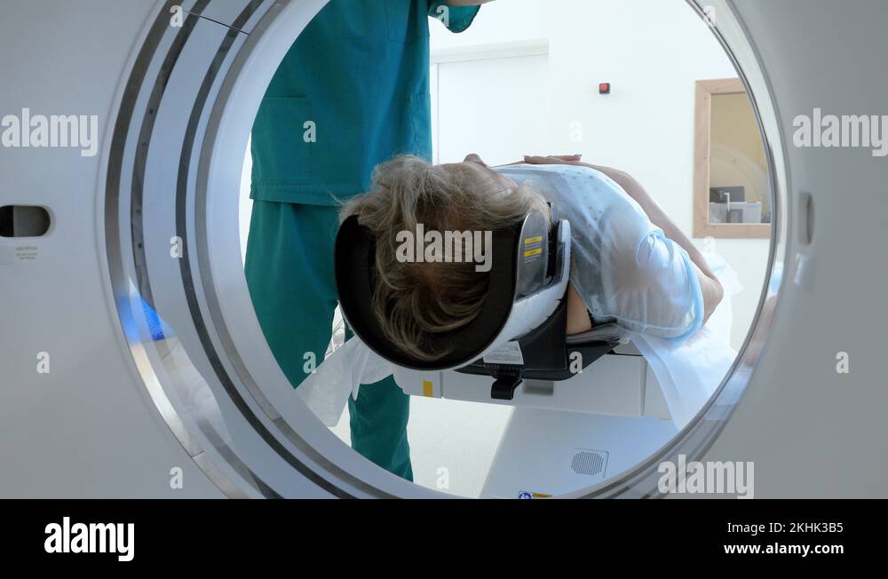 Elderly female patient on medical examination. CT or MRI scan. 4K Stock ...