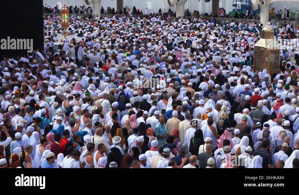 Static top view of Muslim pilgrims circumambulate (or tawaf) the Kaabah ...