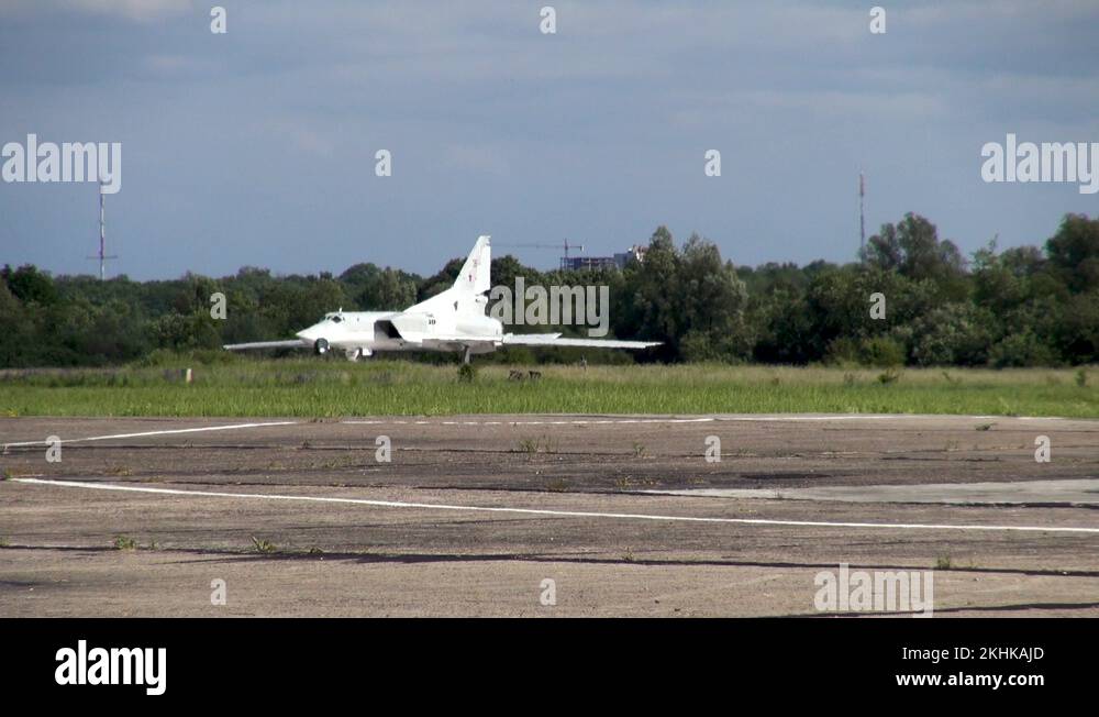 Long-range supersonic bomber Tu-22M3 turns at start of runway for take ...