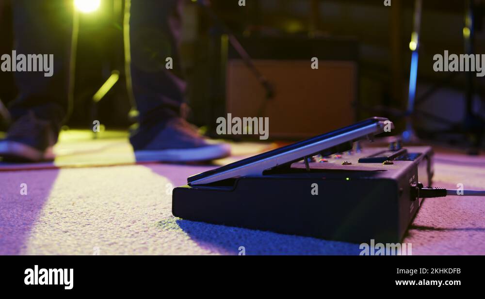 Musician using a pedal point in a music studio Stock Video Footage - Alamy