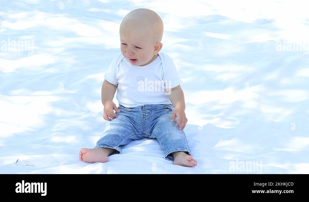 Baby cry cross Stock Videos & Footage - HD and 4K Video Clips - Alamy
