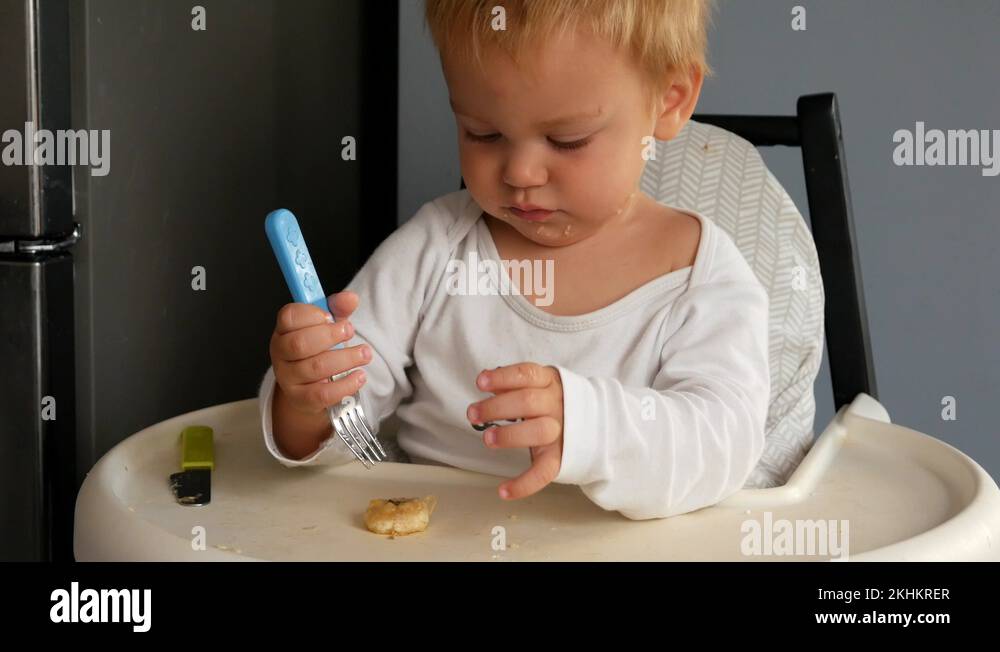 Funny Hilarious Two Year Old Cute Boy Trying to Stab Food Using Fork ...