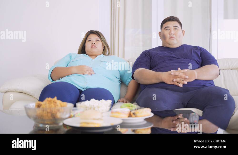 Overweight couple watching tv Stock Videos & Footage - HD and 4K Video ...