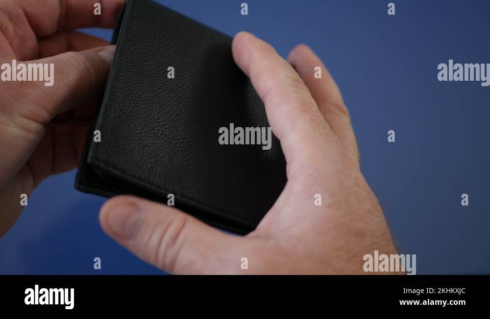 Bankrupt Person Showing an Empty Wallet with No Money Inside Stock ...