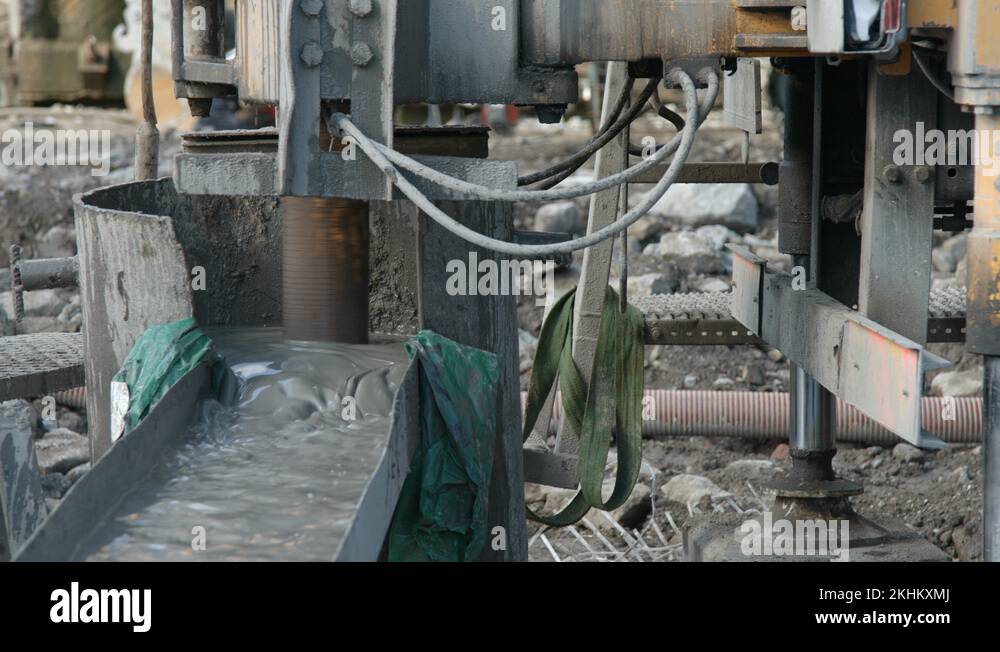 Rotary drill rig truck drilling borehole on construction site Stock ...
