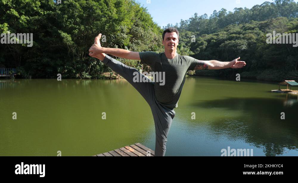 Standing one leg man Stock Videos & Footage - HD and 4K Video Clips - Alamy