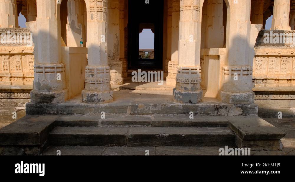 Exterior carved walls and stone pillars of Devi Temple inside historic ...