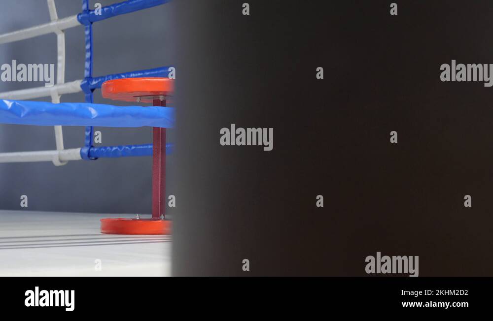 Boxing ring, close up side view. Boxing chair in the corner of the ring ...