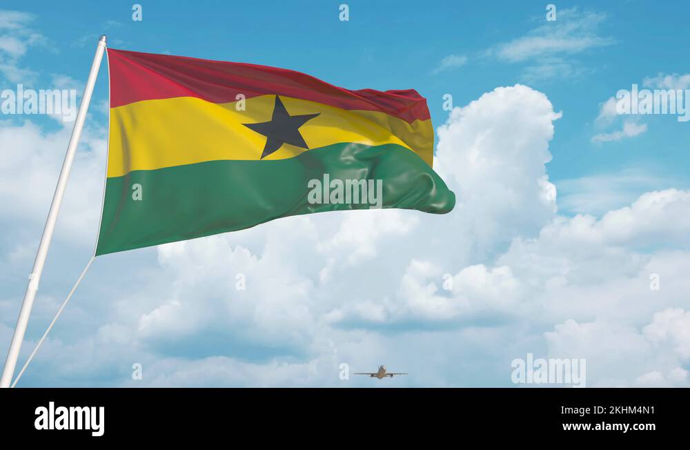 Airliner approaches the Ghanaian national flag. Tourism in Ghana Stock ...