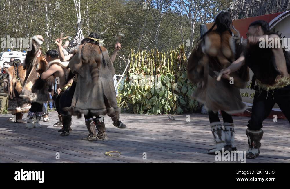 Folklore ensemble of aboriginal people Kamchatka dancing in traditional ...