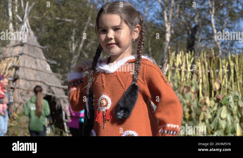 Girl dancing on scene in traditional clothing of aboriginal people of ...