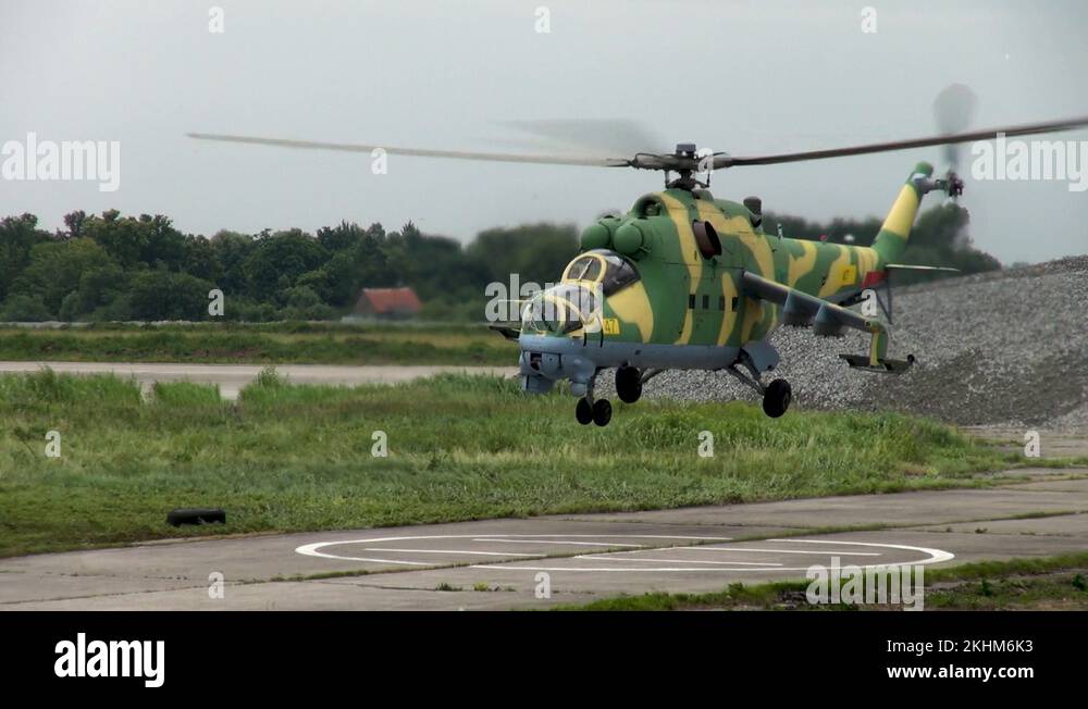 Military helicopter Mi-24 / Mi-35 (NATO: Hind) rotates on its axis ...