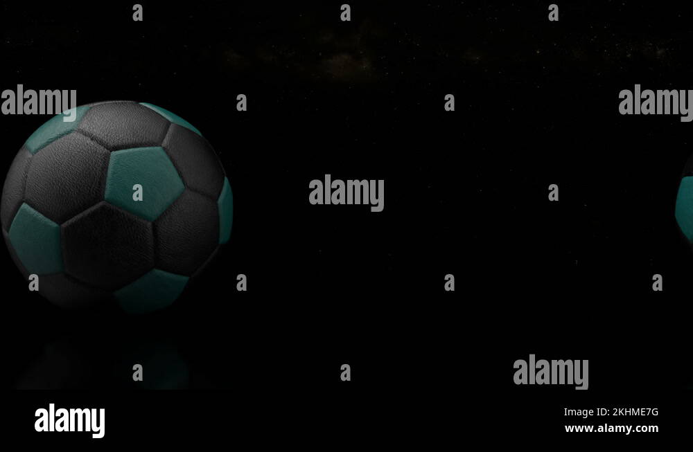 3d design of football balls on the dark background. Looped animation of ...