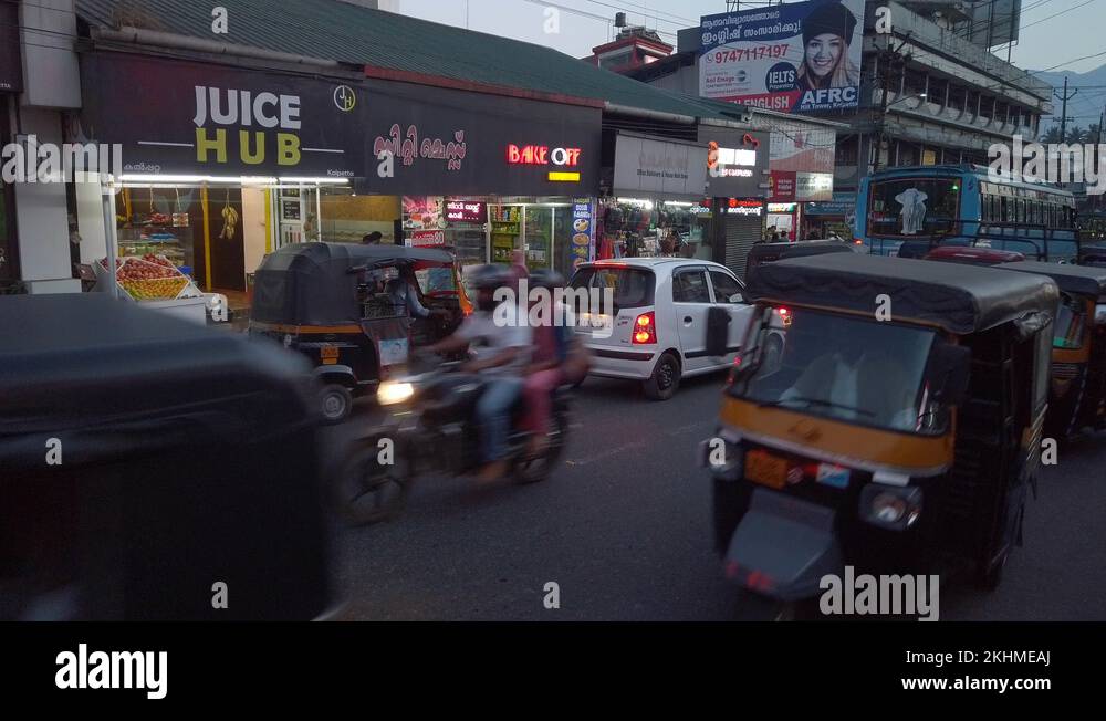 A typical street scene in Kalpetta, Kerala, India. Dusk Stock Video ...