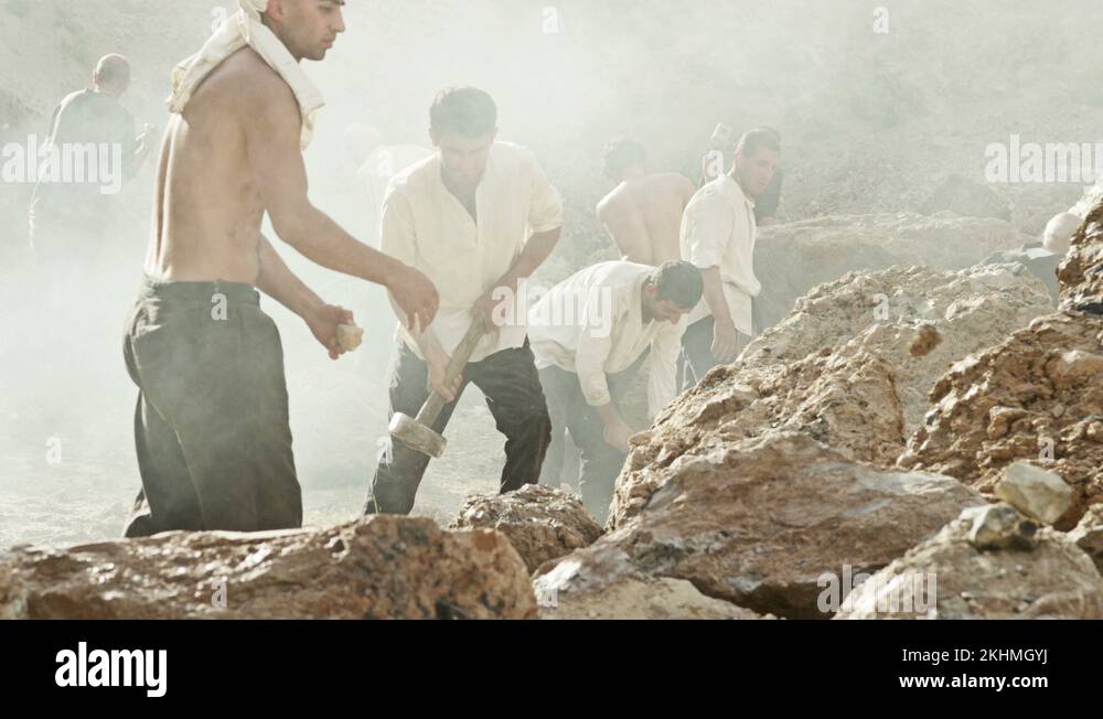 Group of miners or gold diggers working . Many workers mining with axe ...